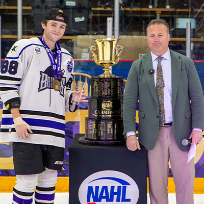 Forward and MVP Jacob MacDonald with NAHL Commissioner Mark Frankenfeld